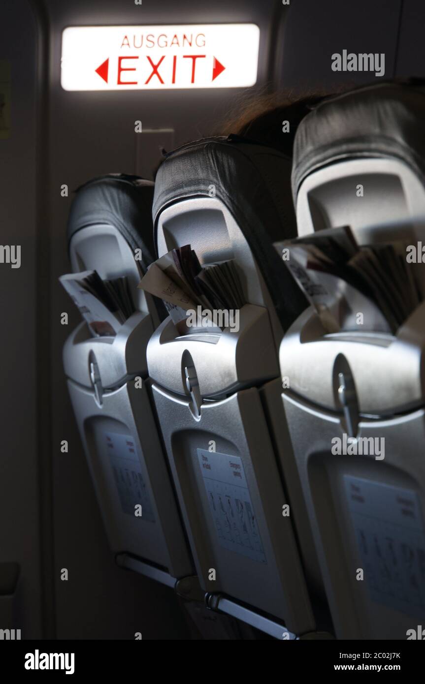 Plane emergency exit hi-res stock photography and images - Alamy