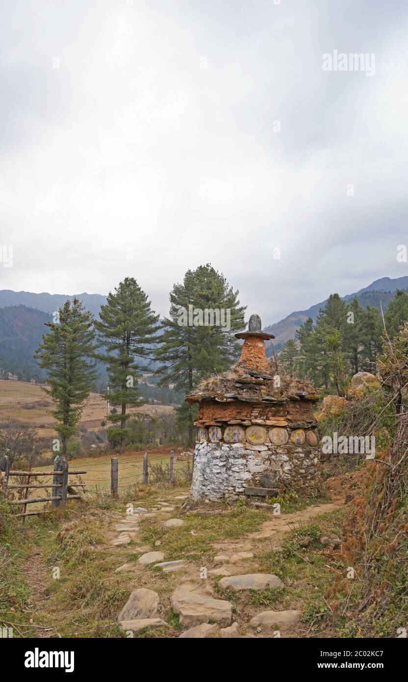 Small round stone Stupa in the mountains, eastern Bhutan Stock Photo ...