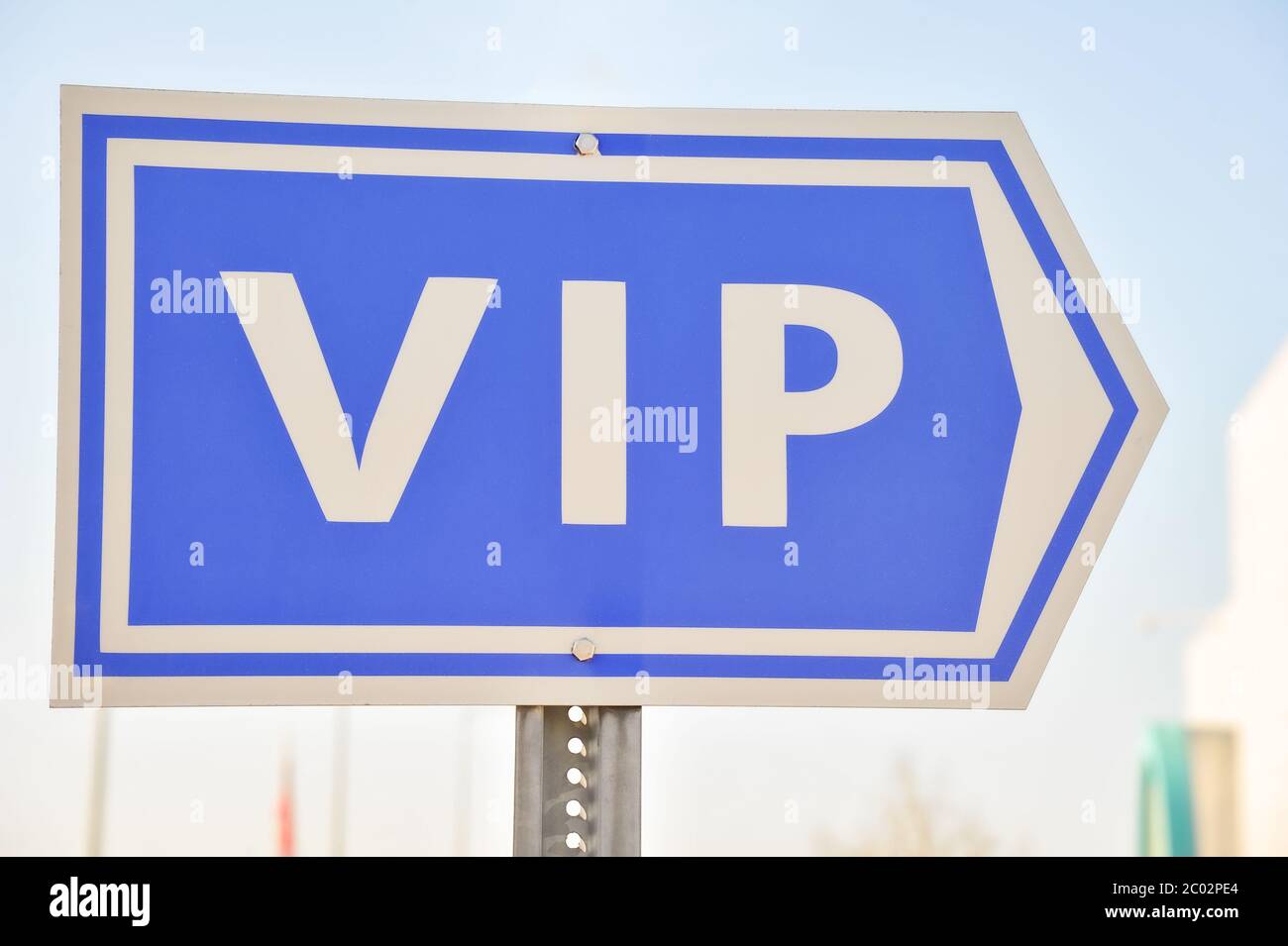 VIP sign arrow with blue color Stock Photo - Alamy
