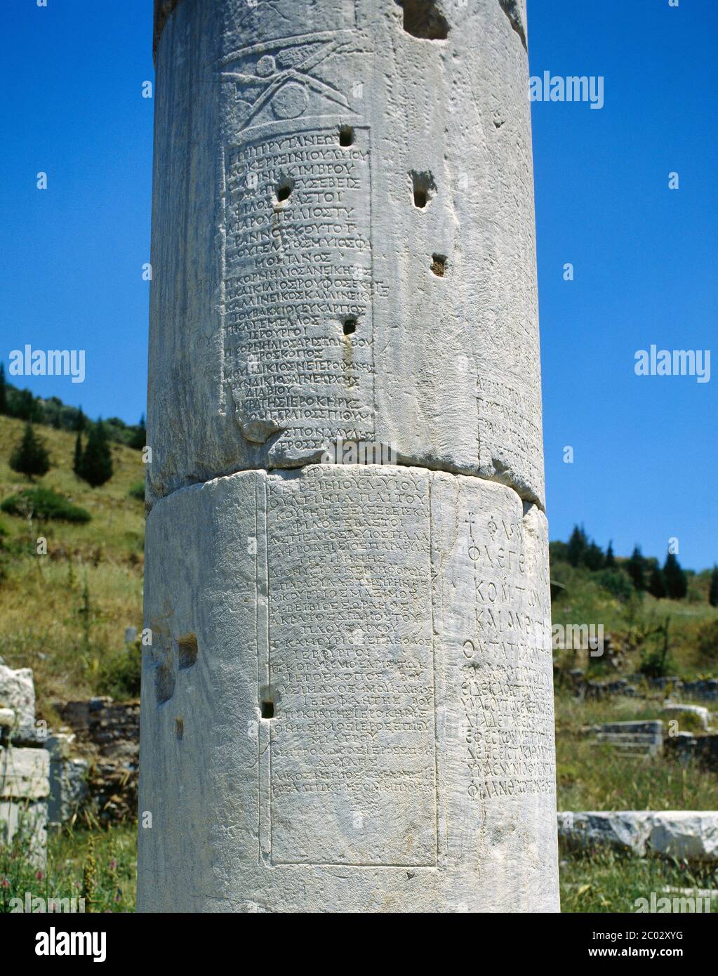 Greek inscription engraved on a marble column. Ephesus city. Turkey ...