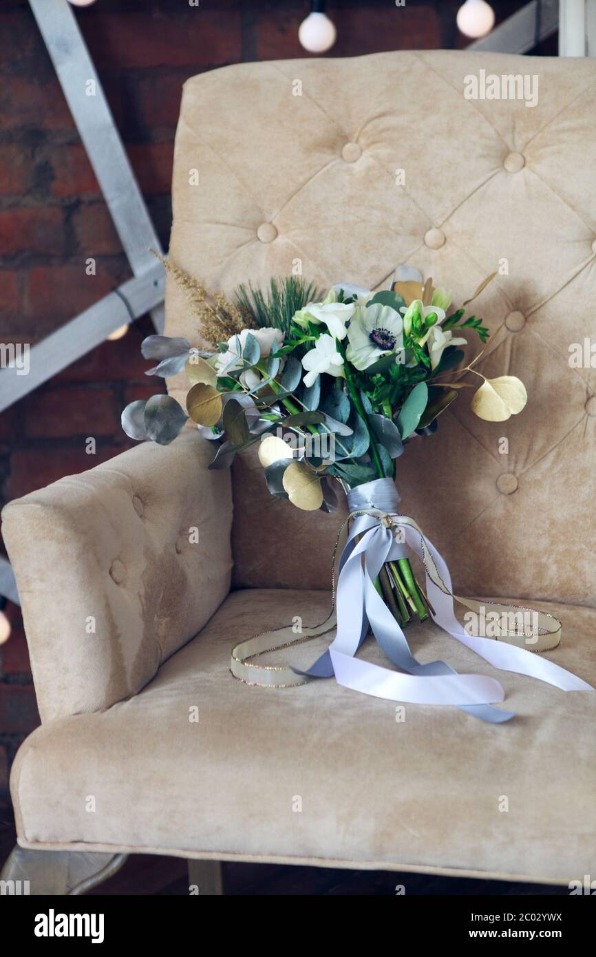 Wedding bouquet with ranunculus, freesia, roses and white anemon Stock ...