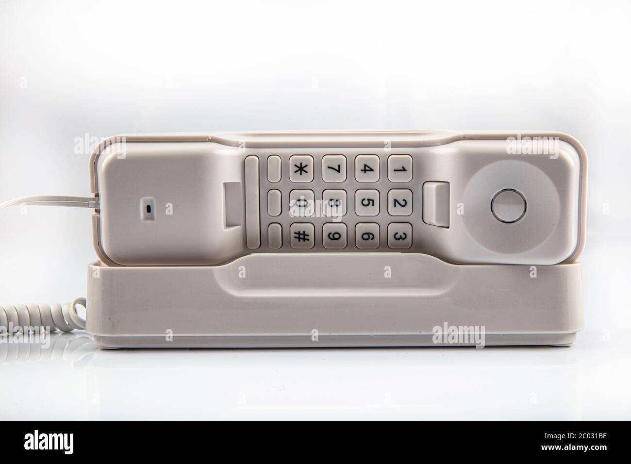 Wall Phone Desk Wall Mountable. Modern white wall phone isolated on ...