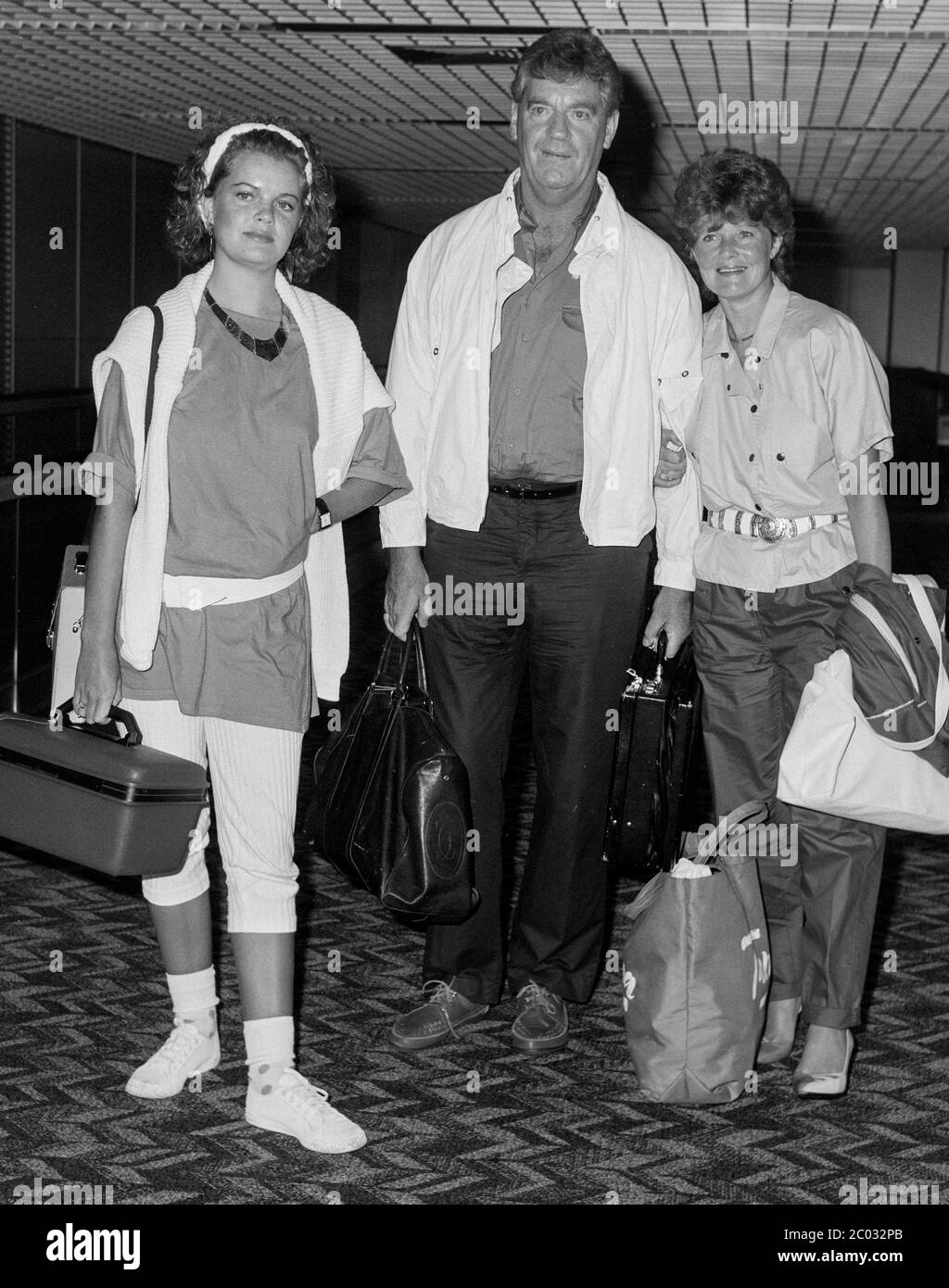 Football manager Lawrie McMenemy leaving London's Heathrow Airport with ...