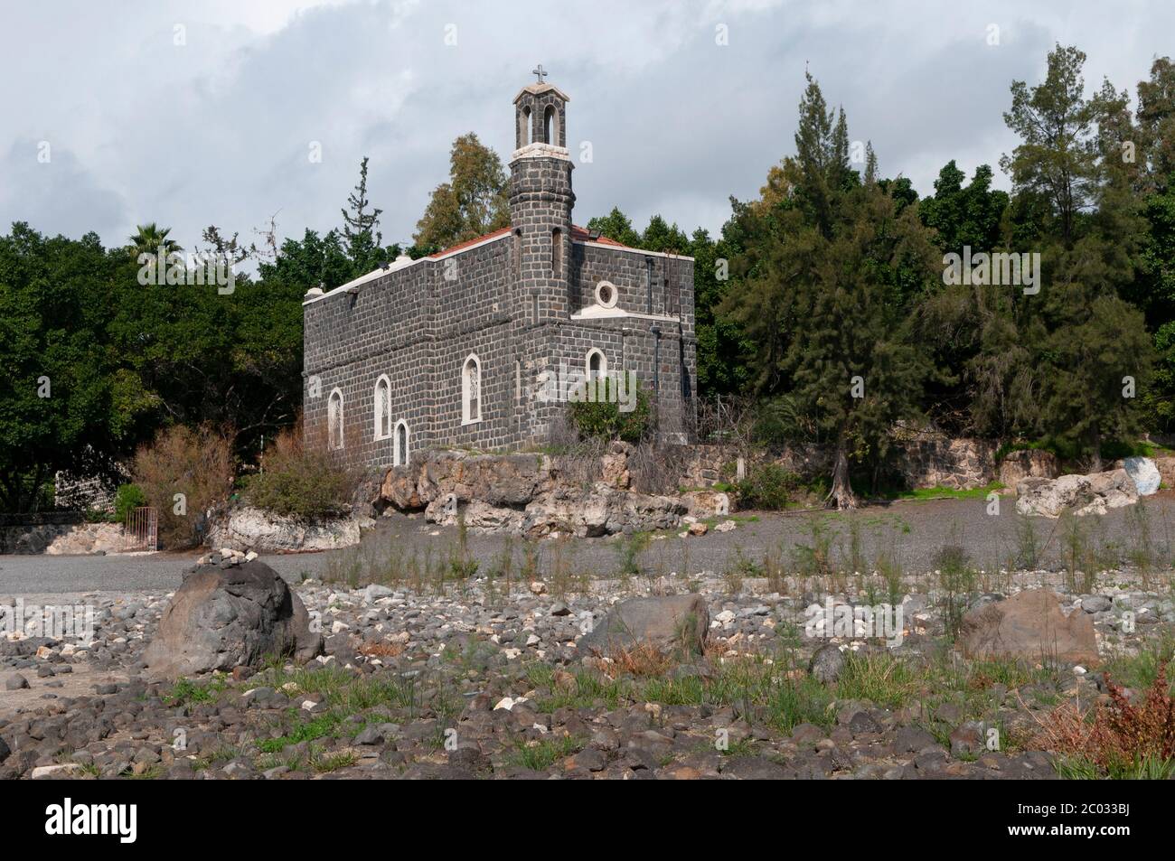 The squat building of black basalt of Church of the Primacy of St Peter ...