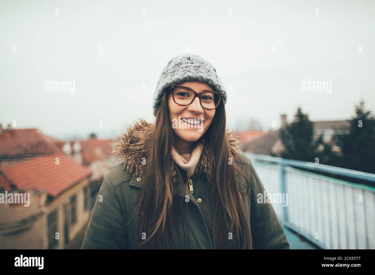 Portrait of pretty millennial girl with eyeglasses Stock Photo - Alamy