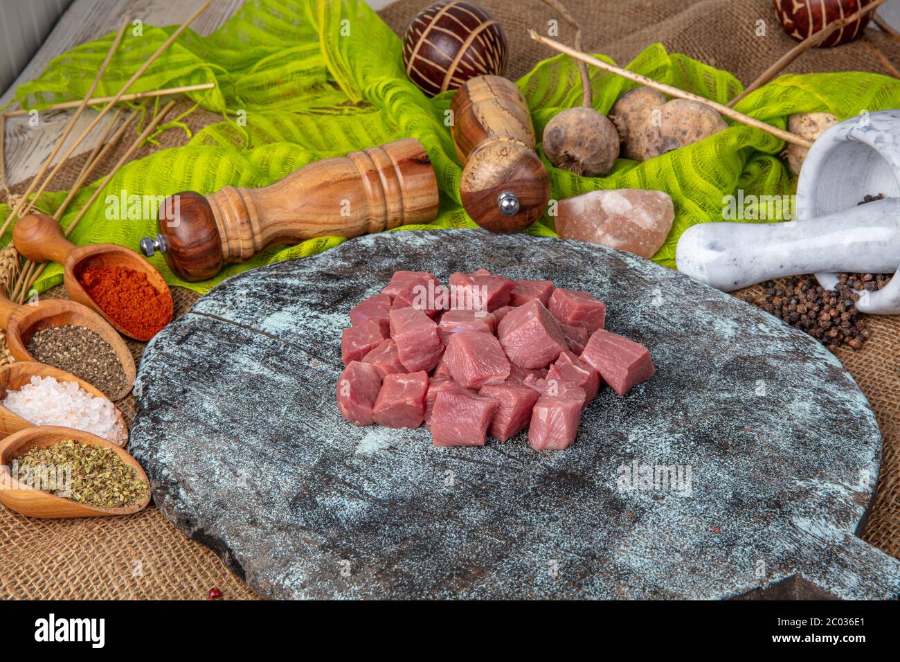 Diced beef on wooden background with space. Raw lean diced casserole ...