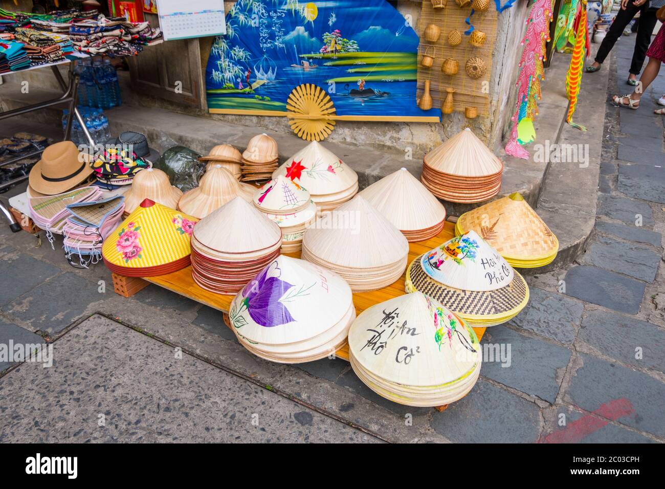 Traditional Vietnamese hats and other souvenirs, Le Loi street, old town, Hoi An, Vietnam, Asia ...