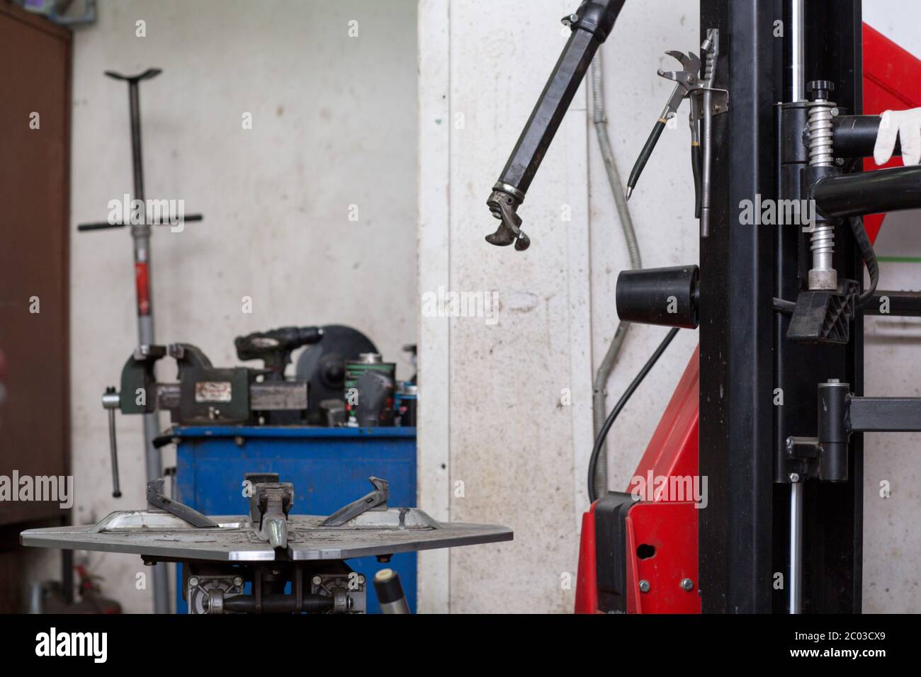 Machine for changing car tire fitting. Wheel tyre repairing Stock Photo ...