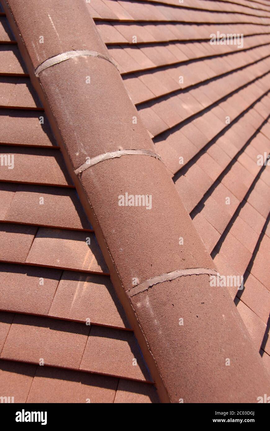 Covered corner of domestic house roof during re-roofing process, Kent ...