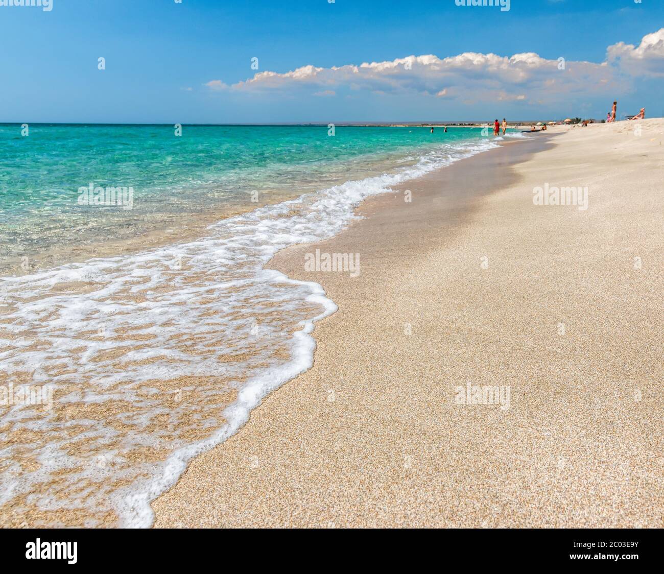 Empty, deserted beach with white sand and crystal clear azure sea ...