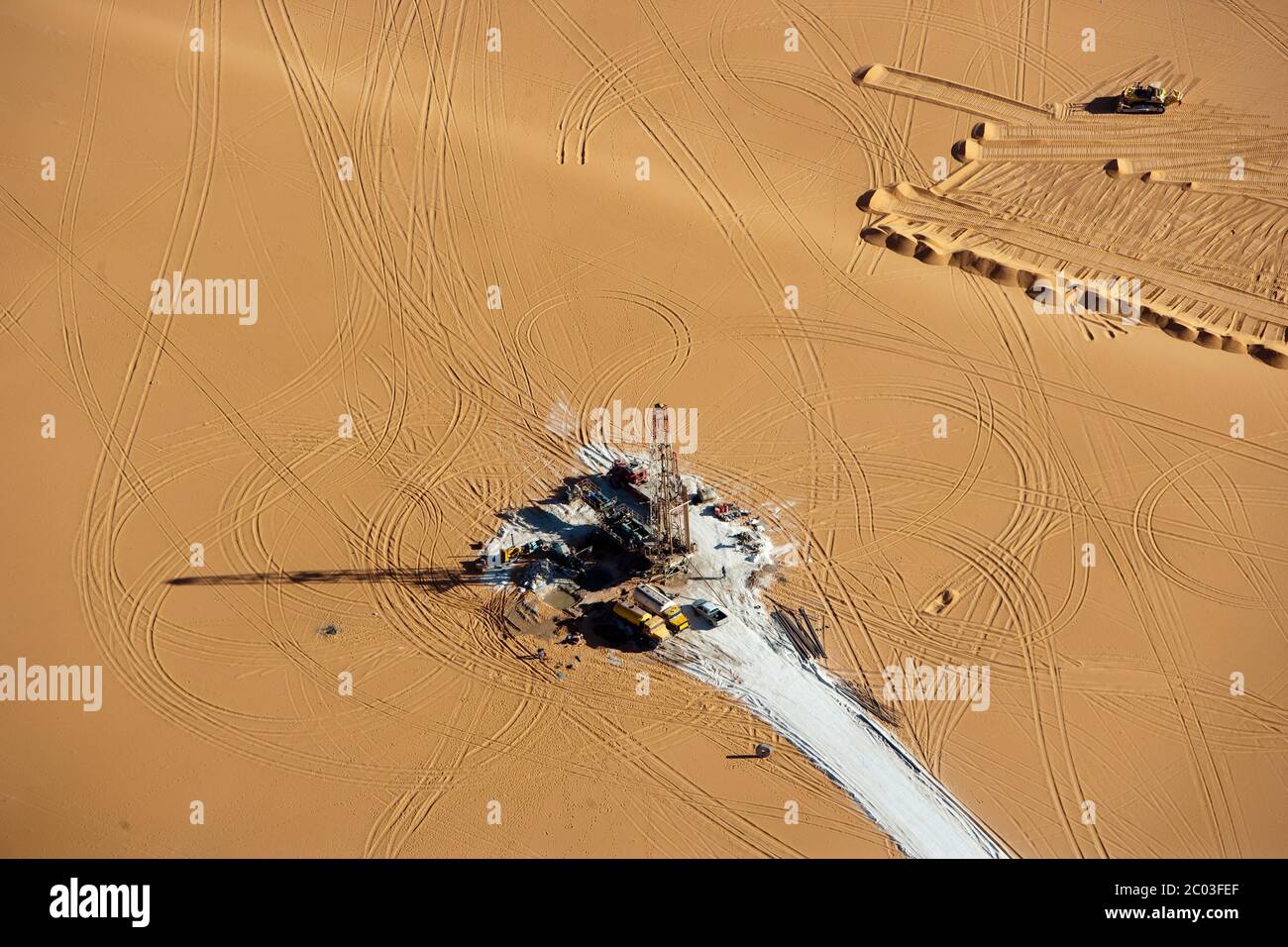 An oil company rig drilling for water, Sahara desert Stock Photo - Alamy