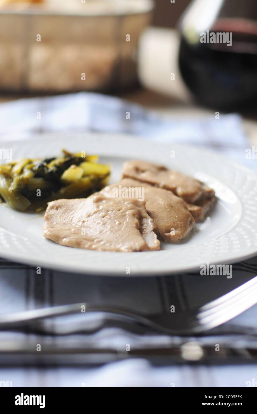 Pork cooked in milk Stock Photo - Alamy