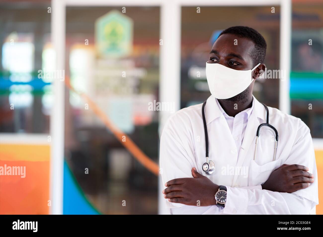 African doctor wear face mask and stethoscope with professional and ...