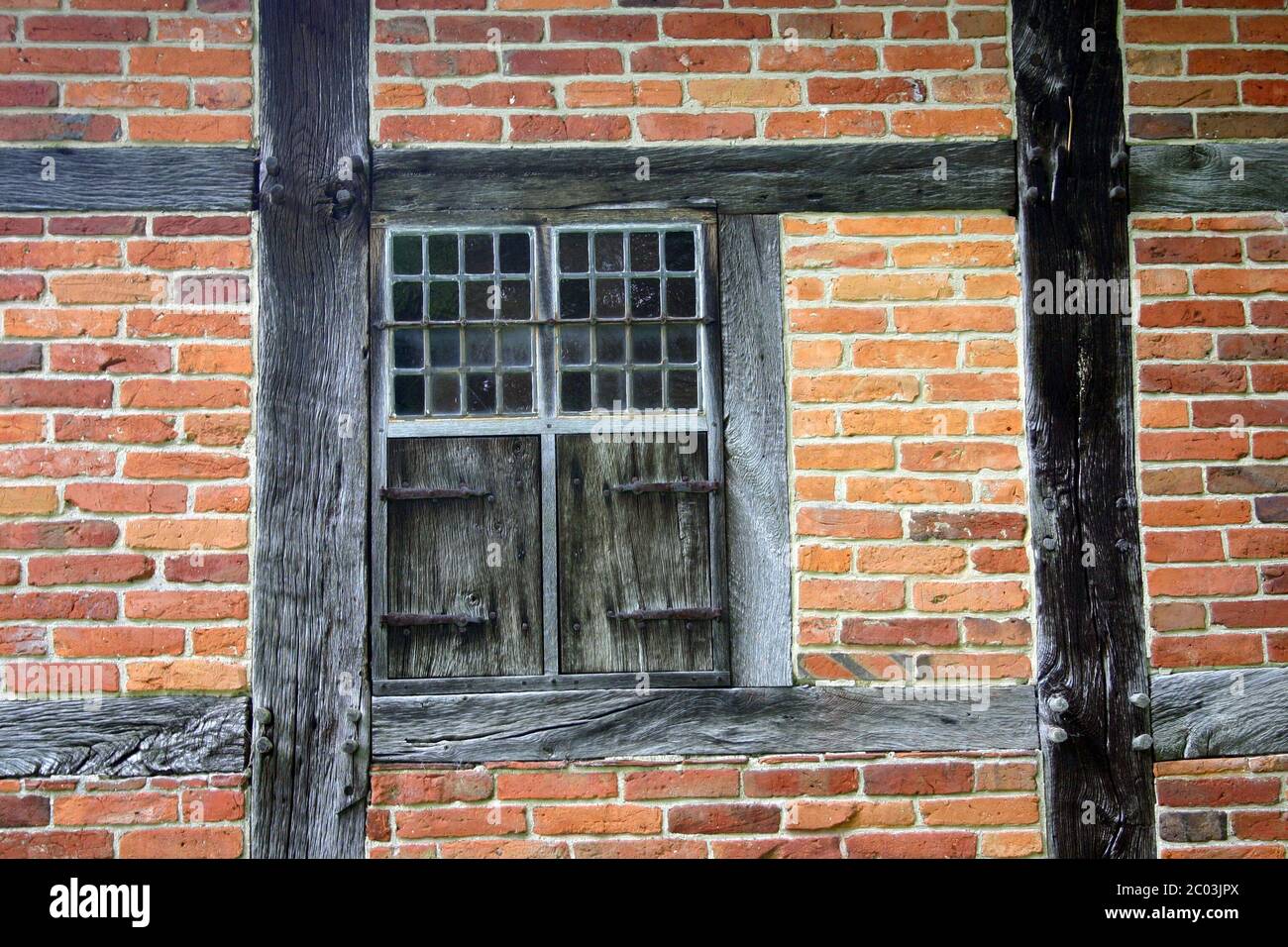 Half-timbered wall with sash bar window Stock Photo - Alamy