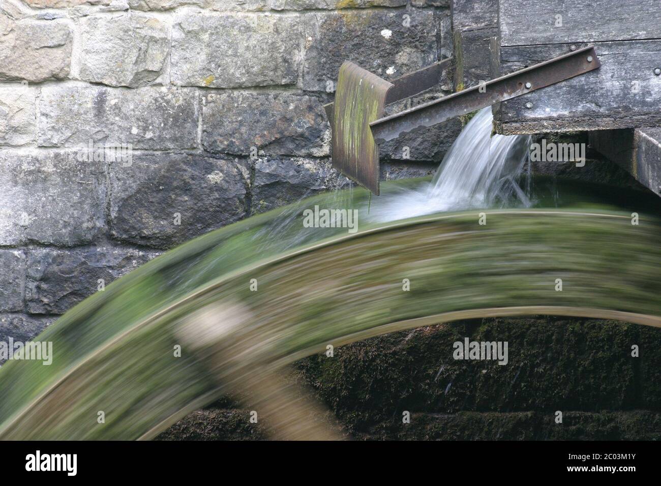 Water wheel of a historical mill Stock Photo - Alamy