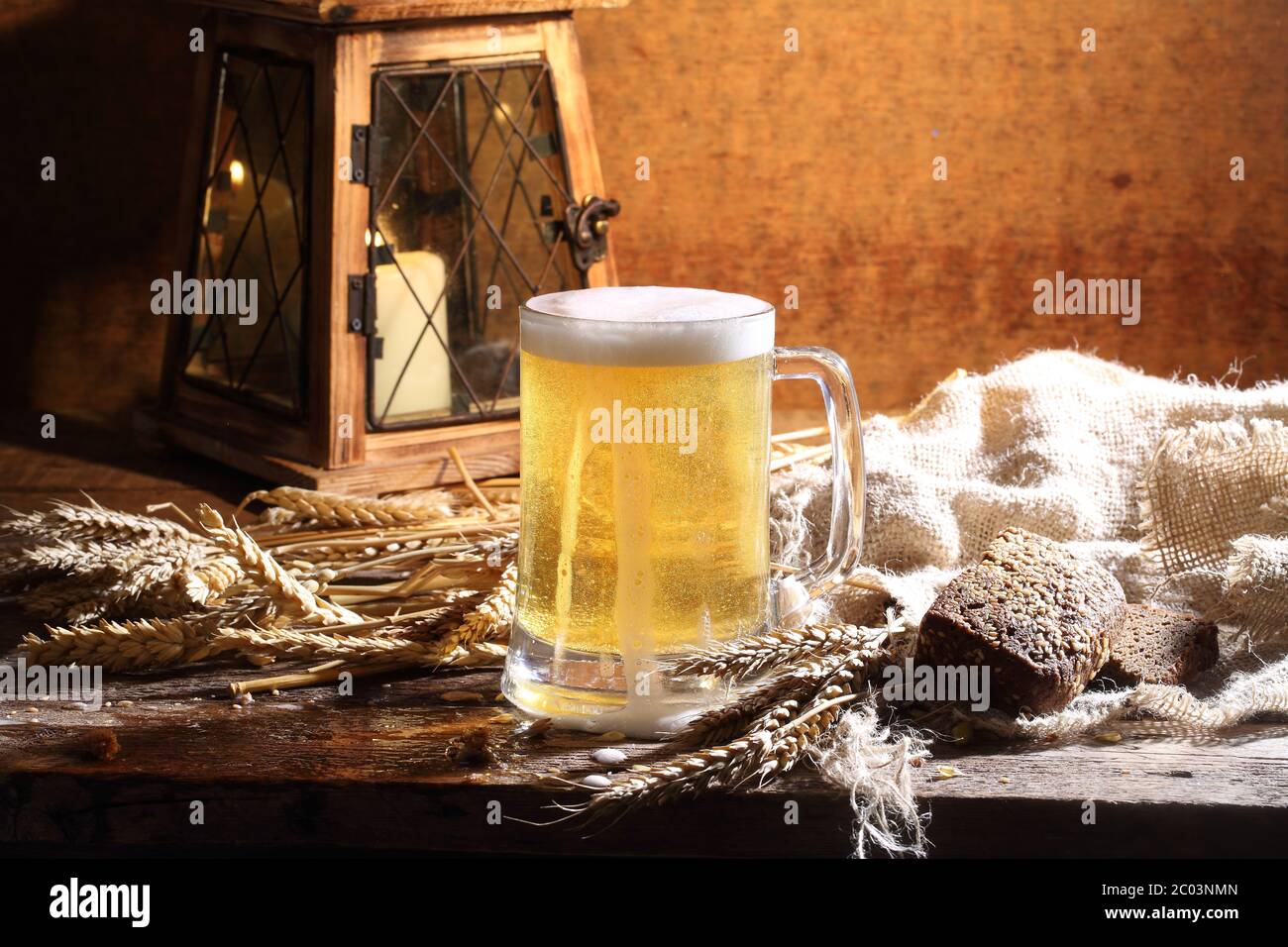 Beer in a transparent mug Stock Photo - Alamy