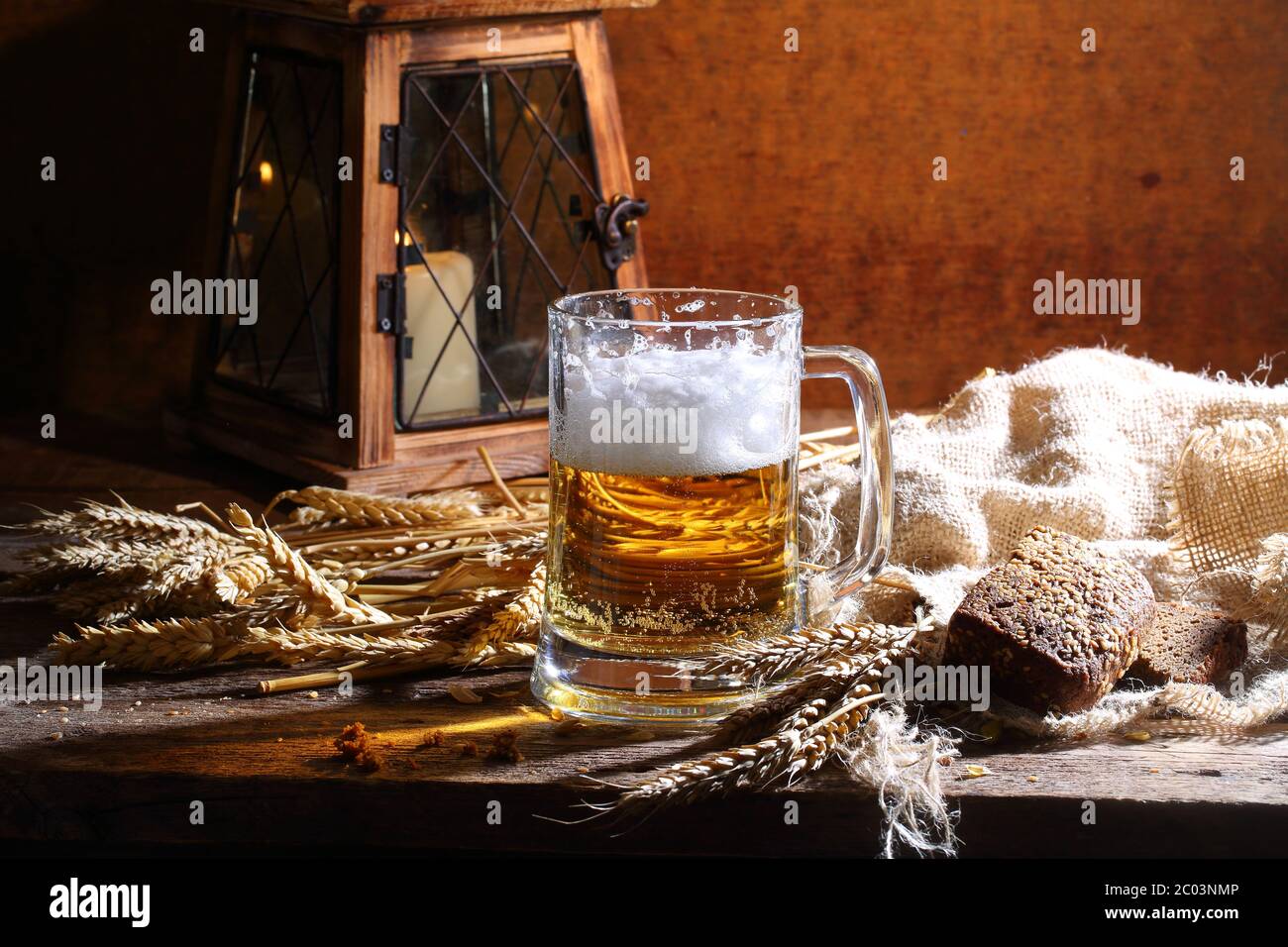 Still-life with beer, bread and cones Stock Photo - Alamy