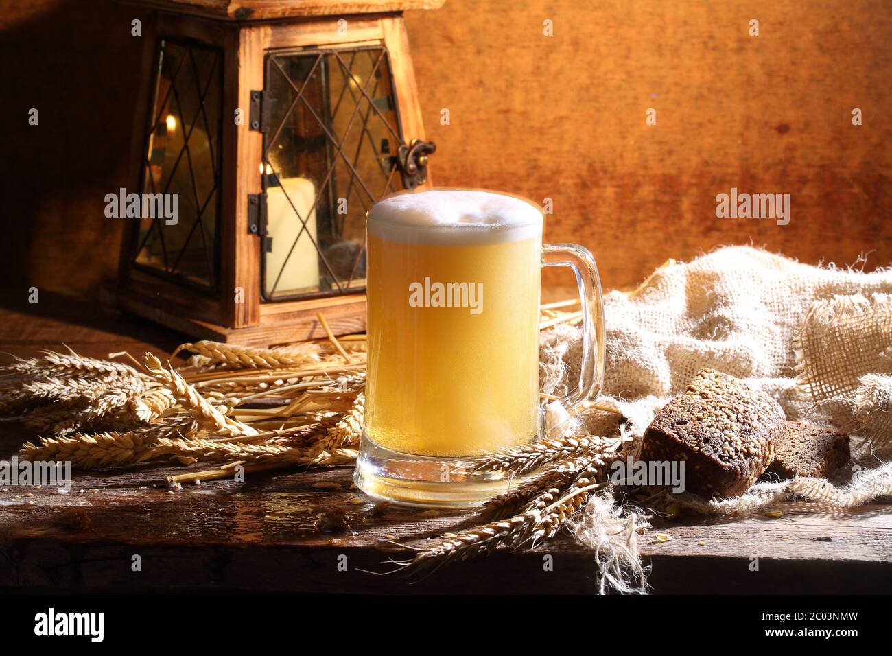 Still-life with beer, bread and cones Stock Photo - Alamy