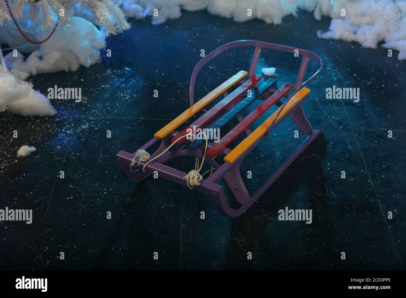 Sledge on an evening skating rink, scenery Stock Photo - Alamy