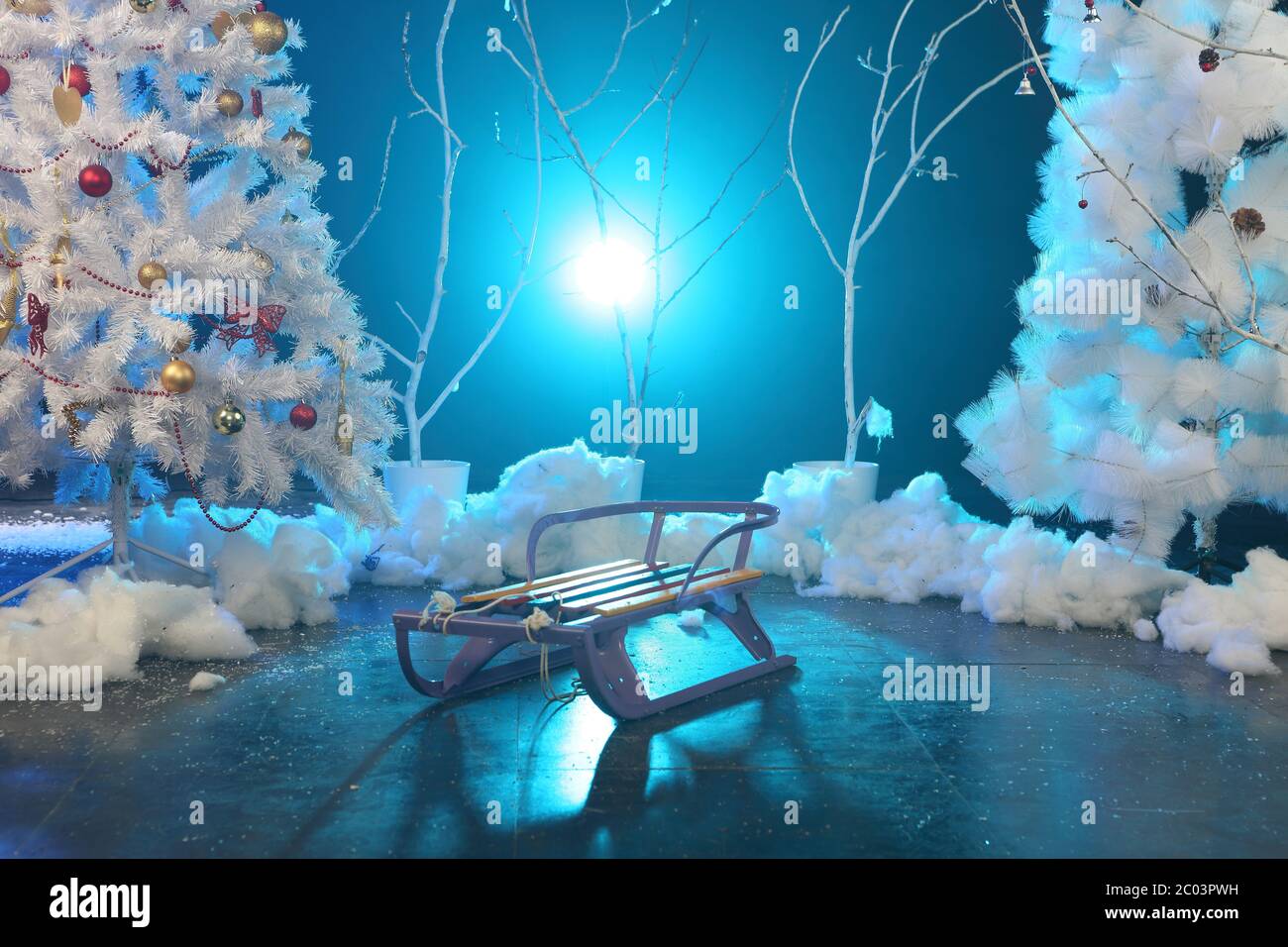 Sledge on an evening skating rink, scenery Stock Photo - Alamy
