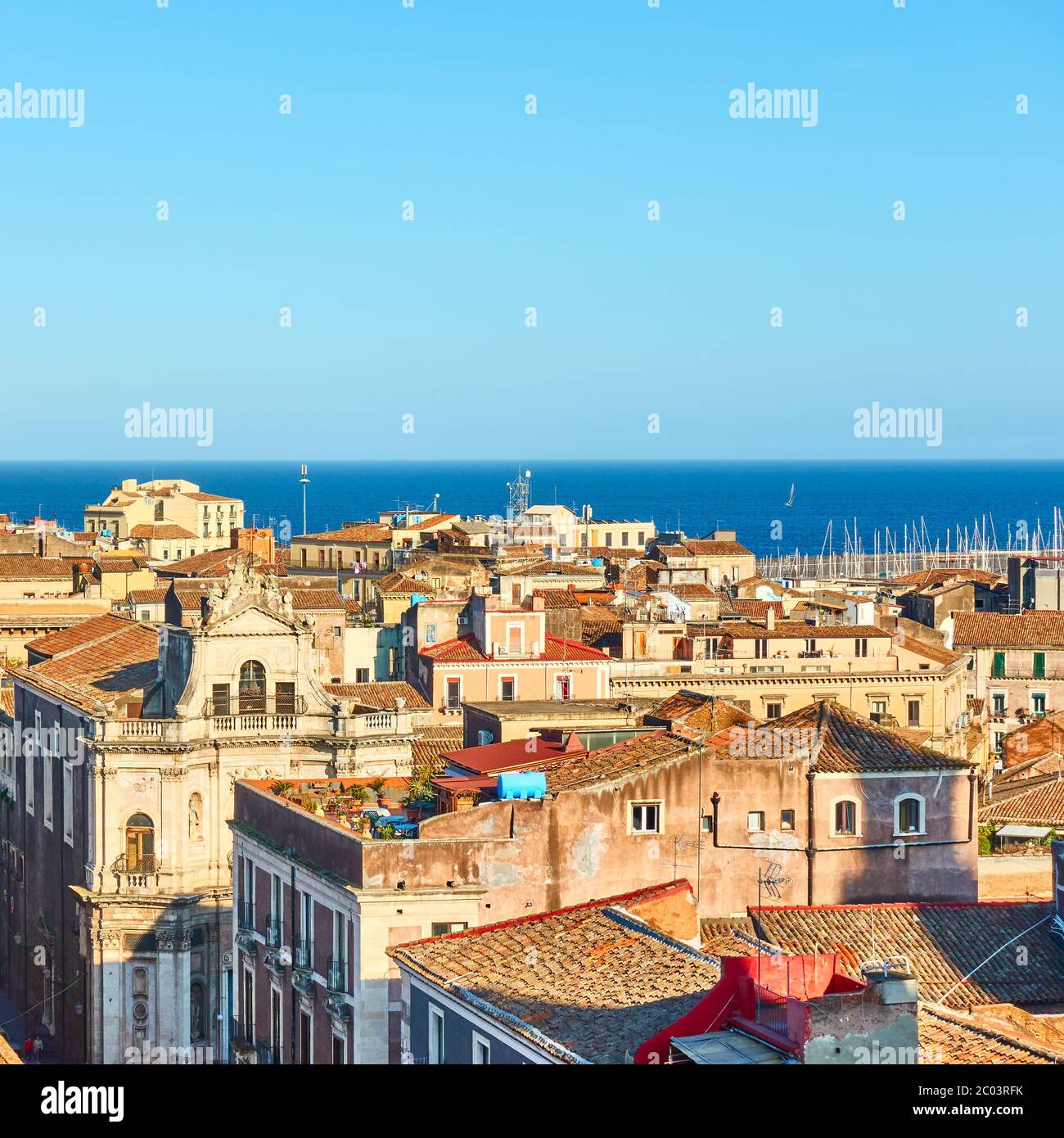 The sea and roofs of the old town of Catania in Sicily, Italy Stock ...
