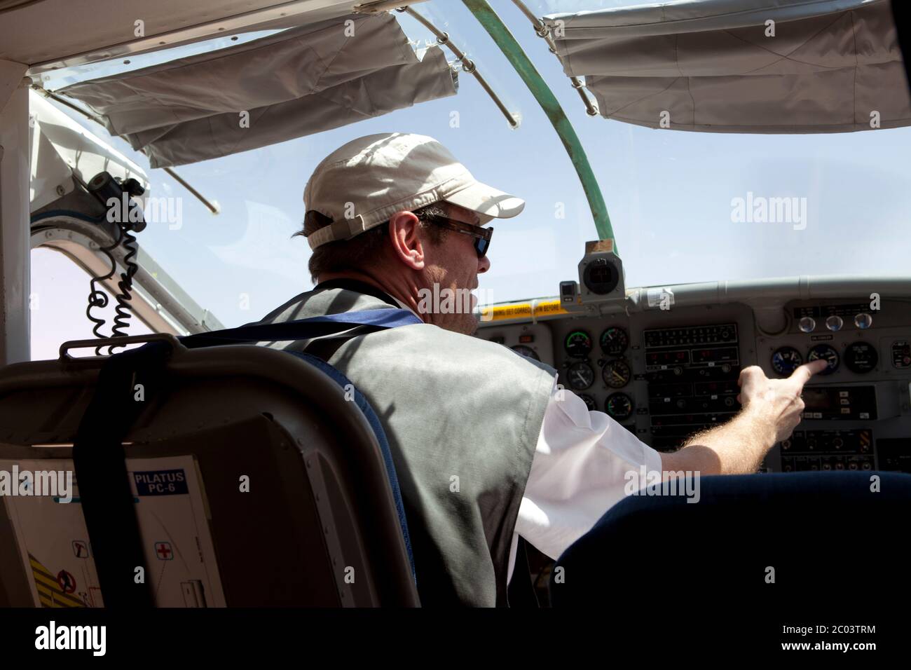 A pilot of a Pilatus aircraft making a turn prior to landing at an ...