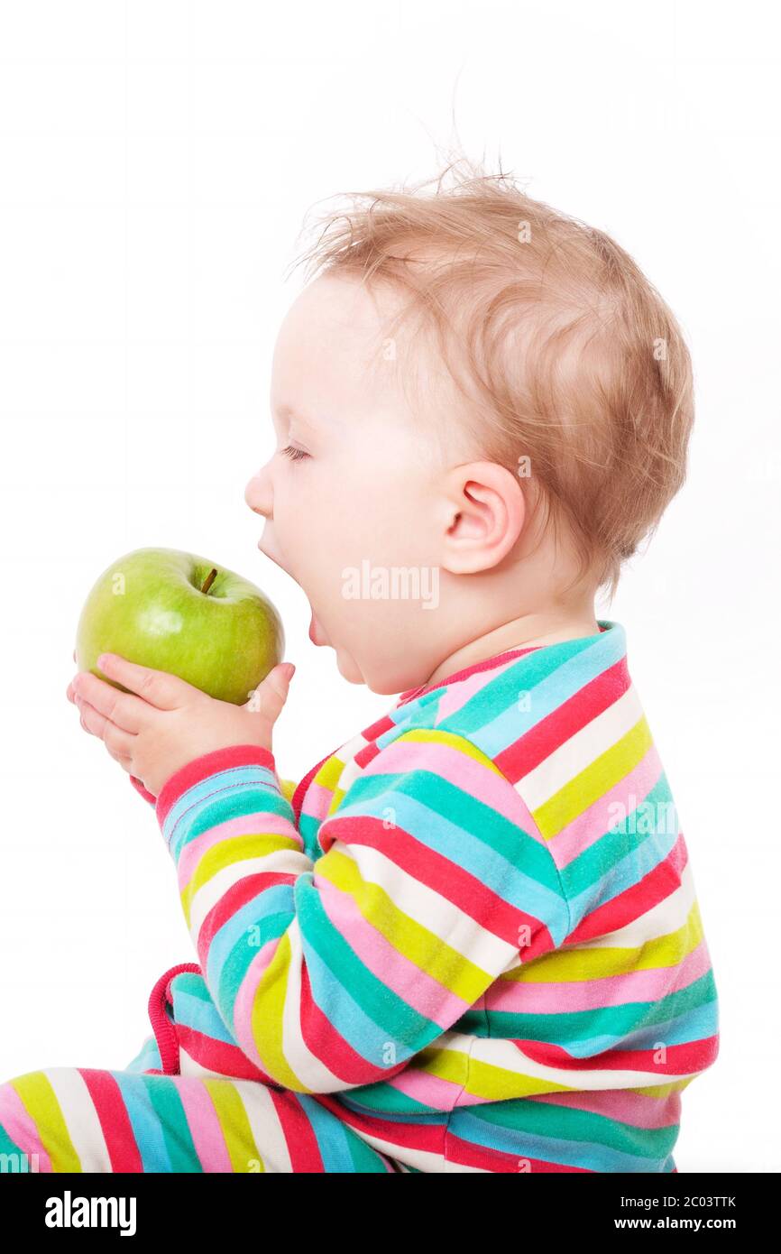 Baby eating apple hi-res stock photography and images - Alamy