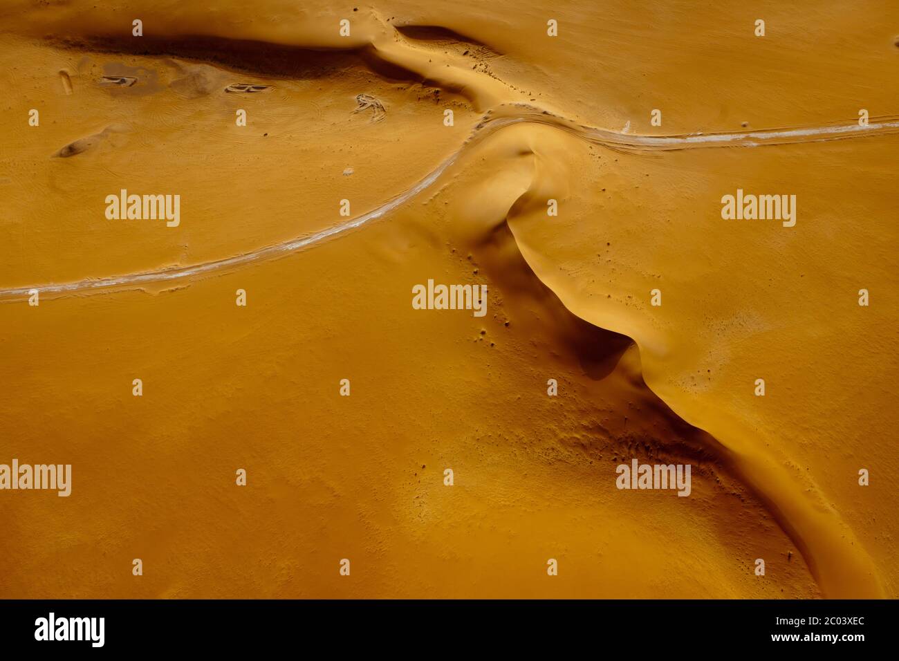 A road through the Sahara desert built by an oil company to facilitate ...