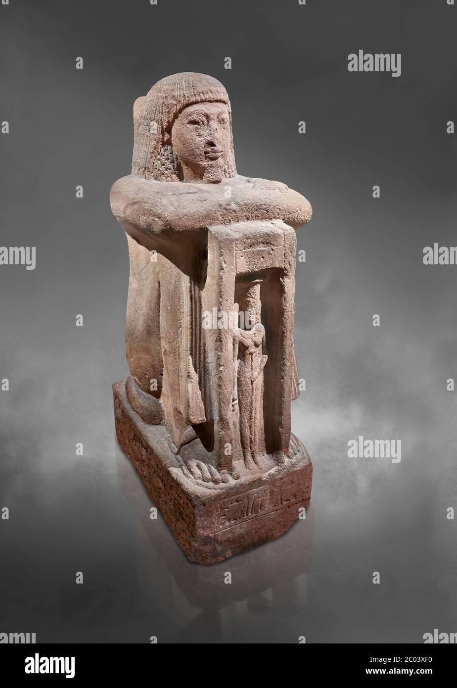 Ancient Egyptian statue of Qen, priest of Anukis, sanstone, New Kingdom ...