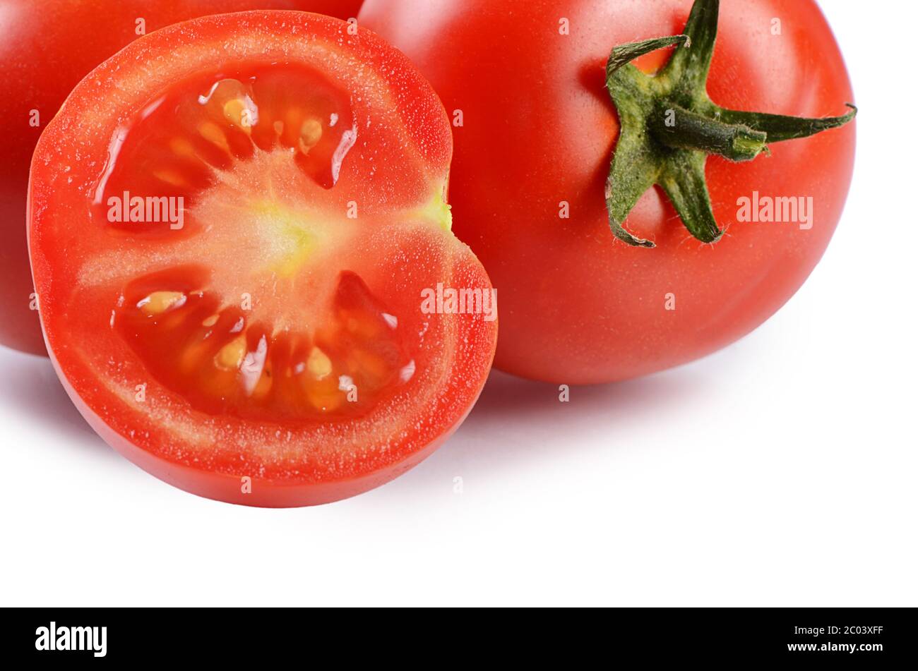 The red fresh tomatoes cut Stock Photo - Alamy