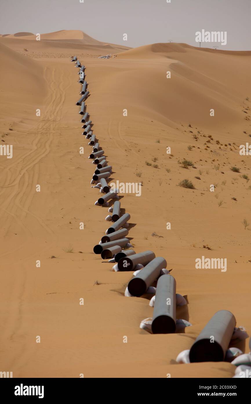 A line of pipes positioned ready for welding for an oil company in the ...