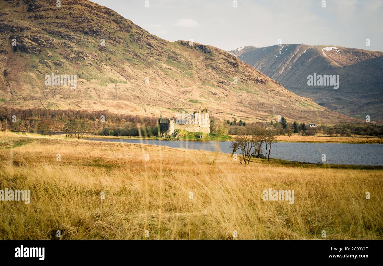 Historic Castle ruins on a lake morning in Scotland - Kilchurn Castle ...