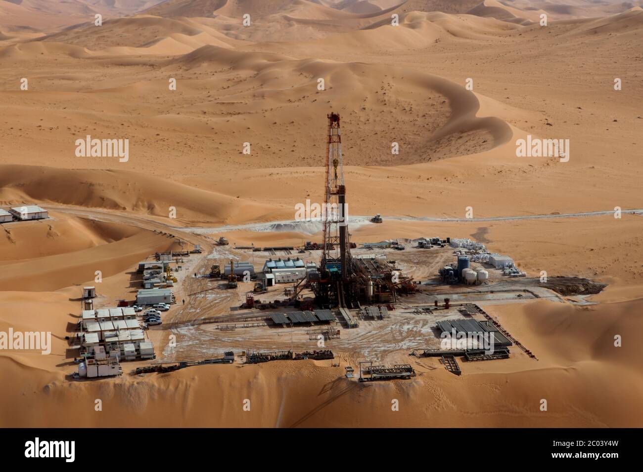 An oil company rig drilling for oil, Sahara desert Stock Photo - Alamy