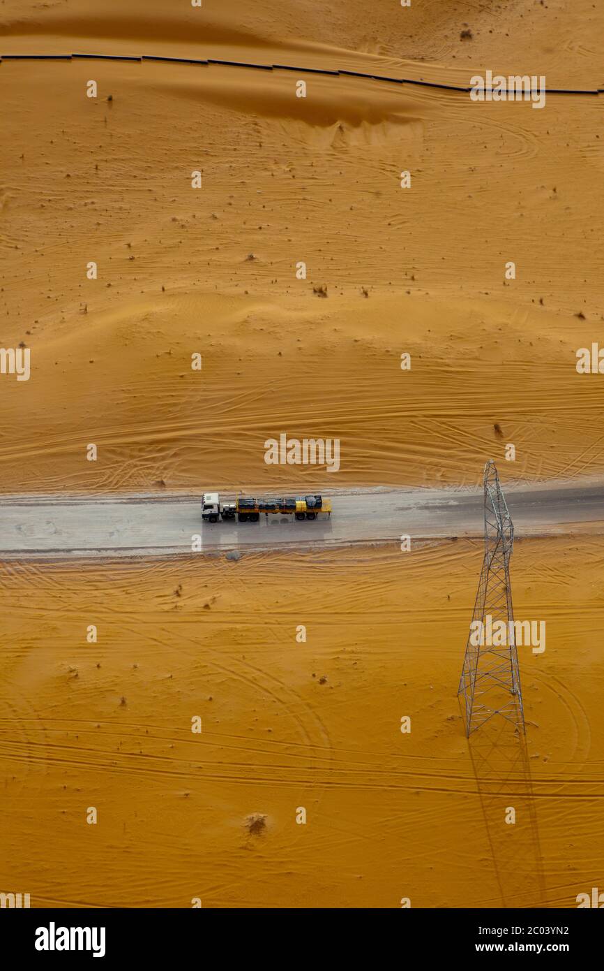 A road through the Sahara desert built by an oil company to facilitate ...