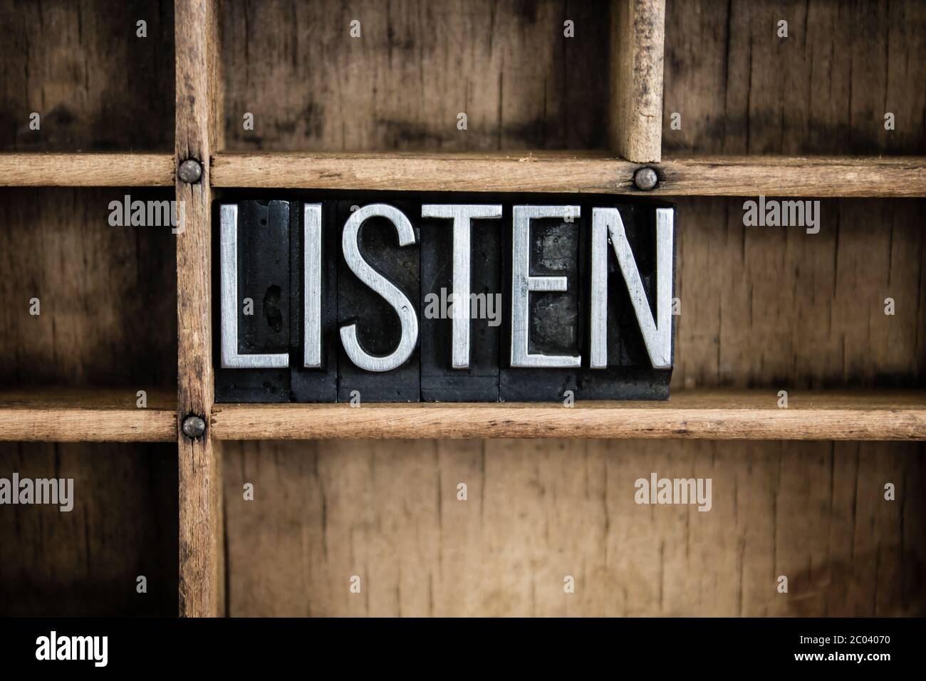Listen Concept Metal Letterpress Word in Drawer Stock Photo - Alamy