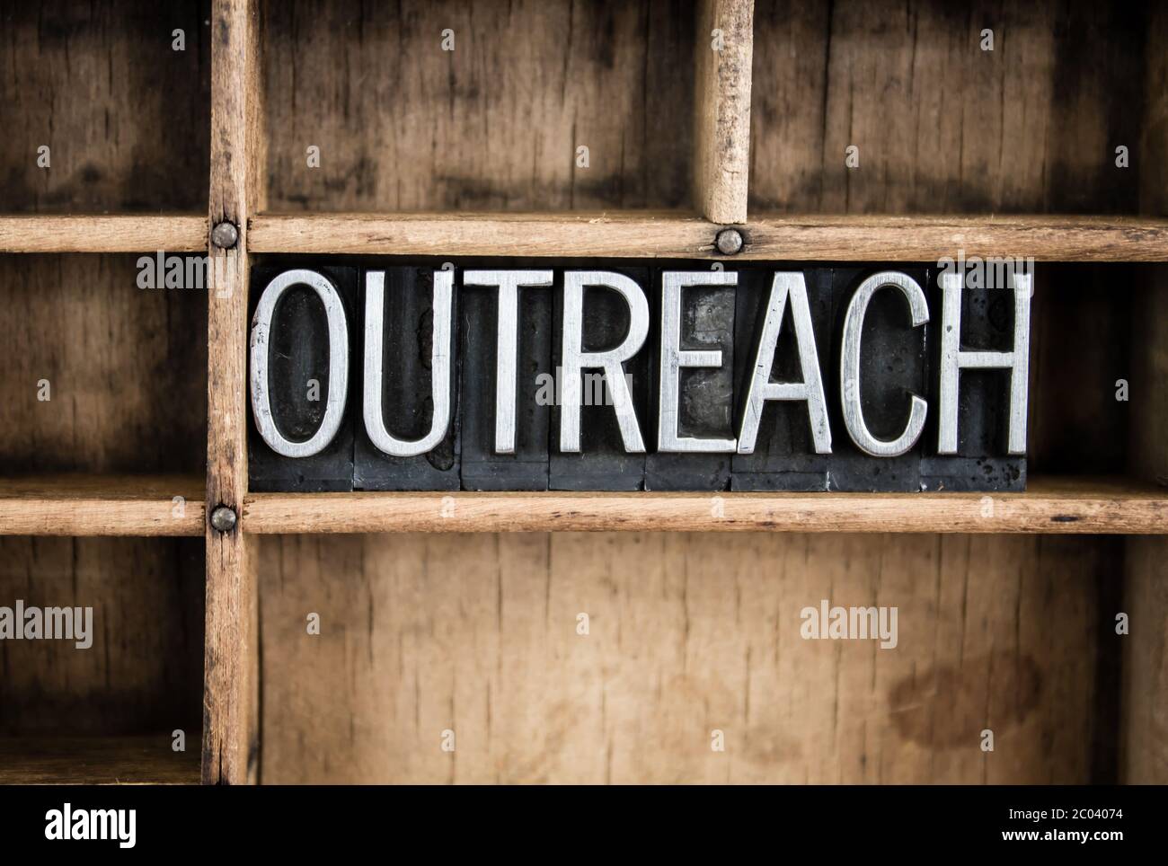 Outreach Concept Metal Letterpress Word in Drawer Stock Photo - Alamy