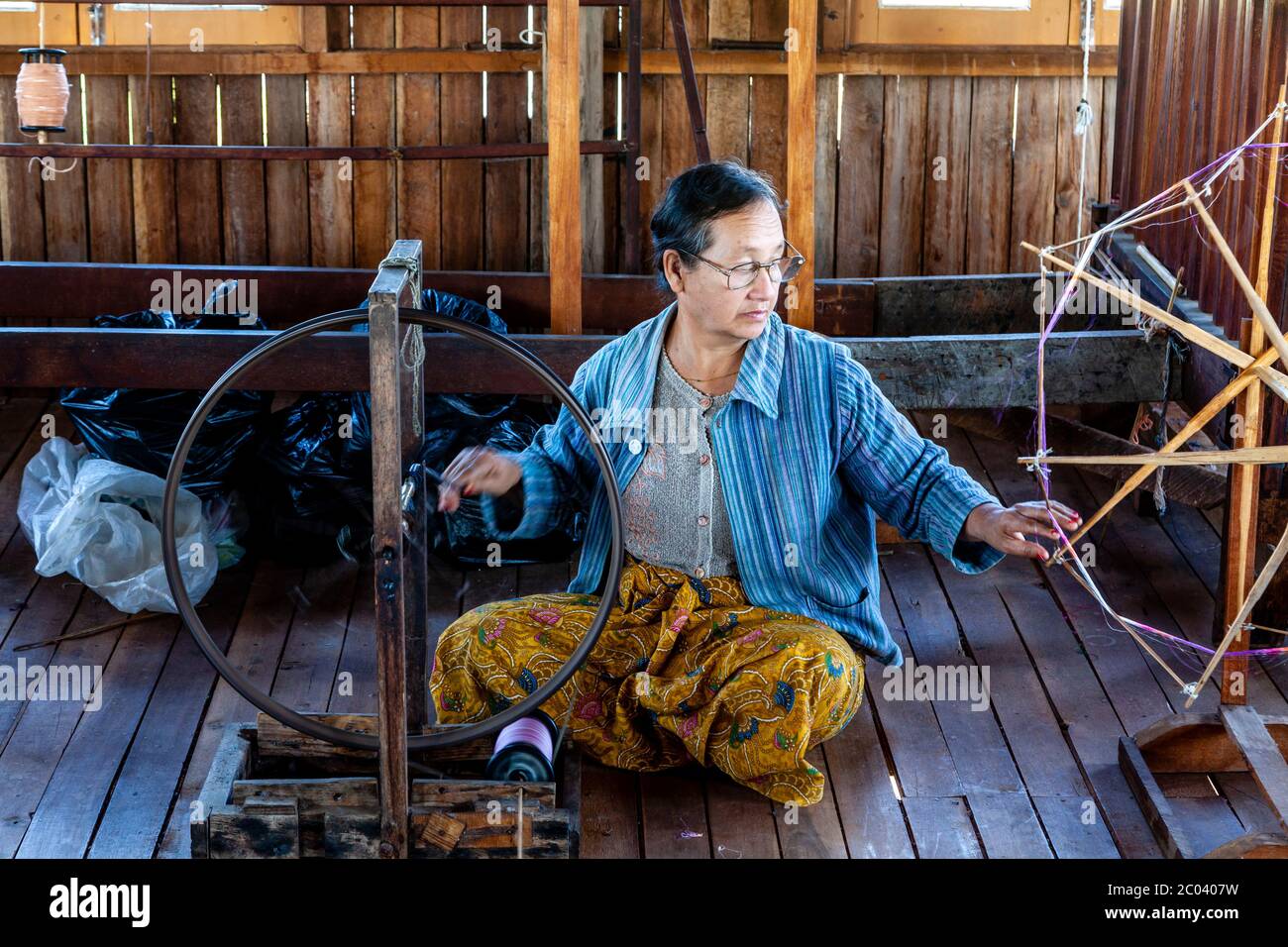 Woman working in a textile factory hi-res stock photography and images ...