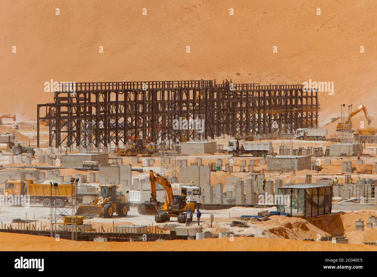 Steel pipe-run frameworks and concrete foundations being constructed ...