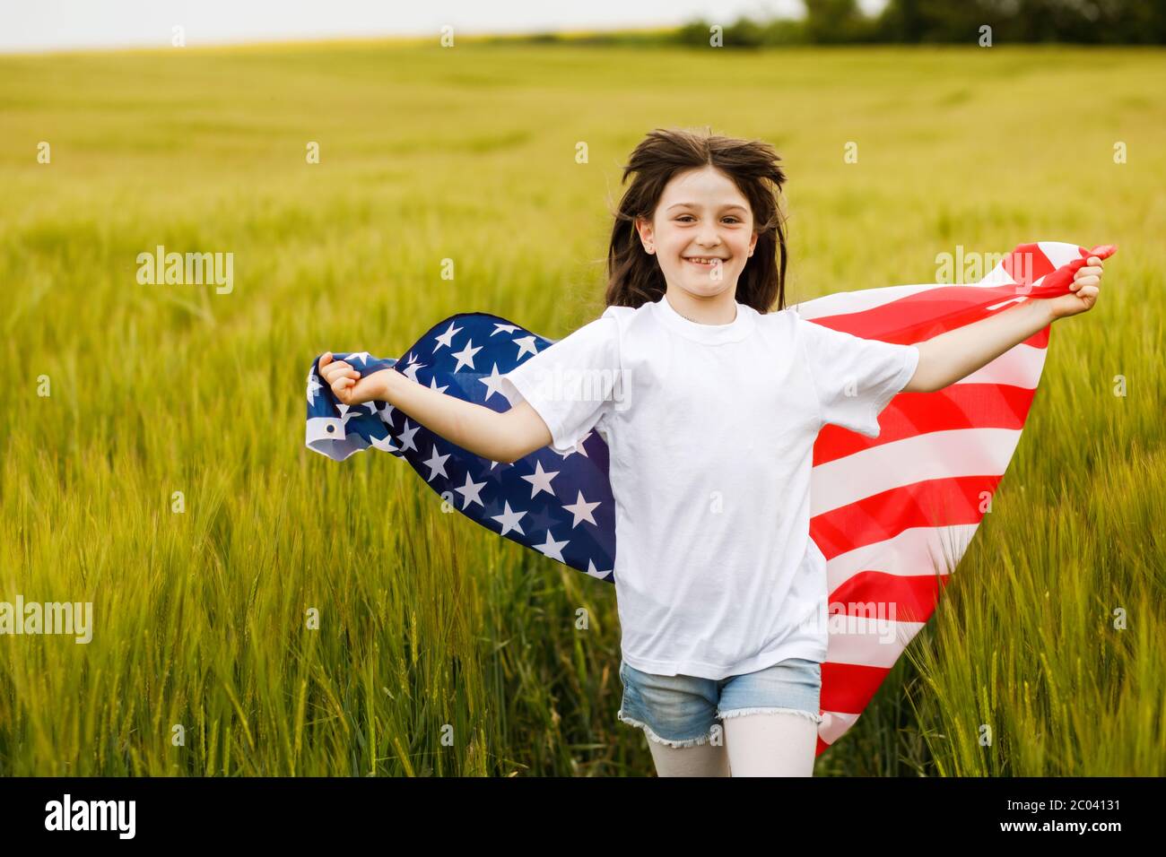 Us girl running flag hi-res stock photography and images - Alamy