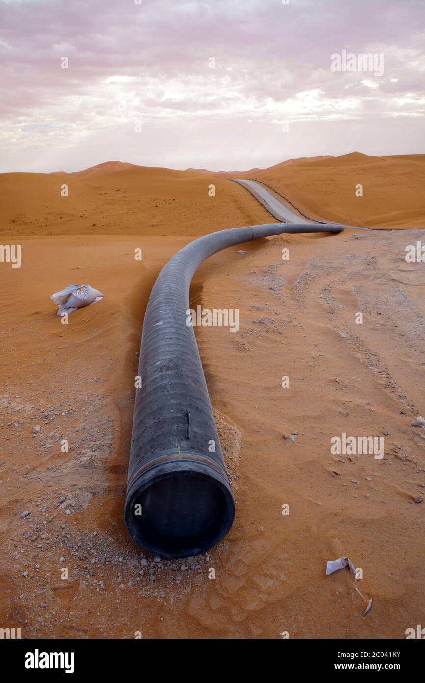 A line of pipes positioned ready for welding for an oil company in the ...