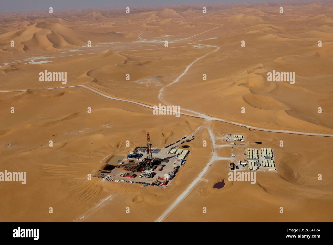 An oil company rig drilling for oil, Sahara desert Stock Photo - Alamy