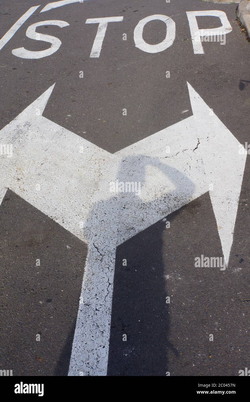 Stop street and direction arrows Stock Photo - Alamy