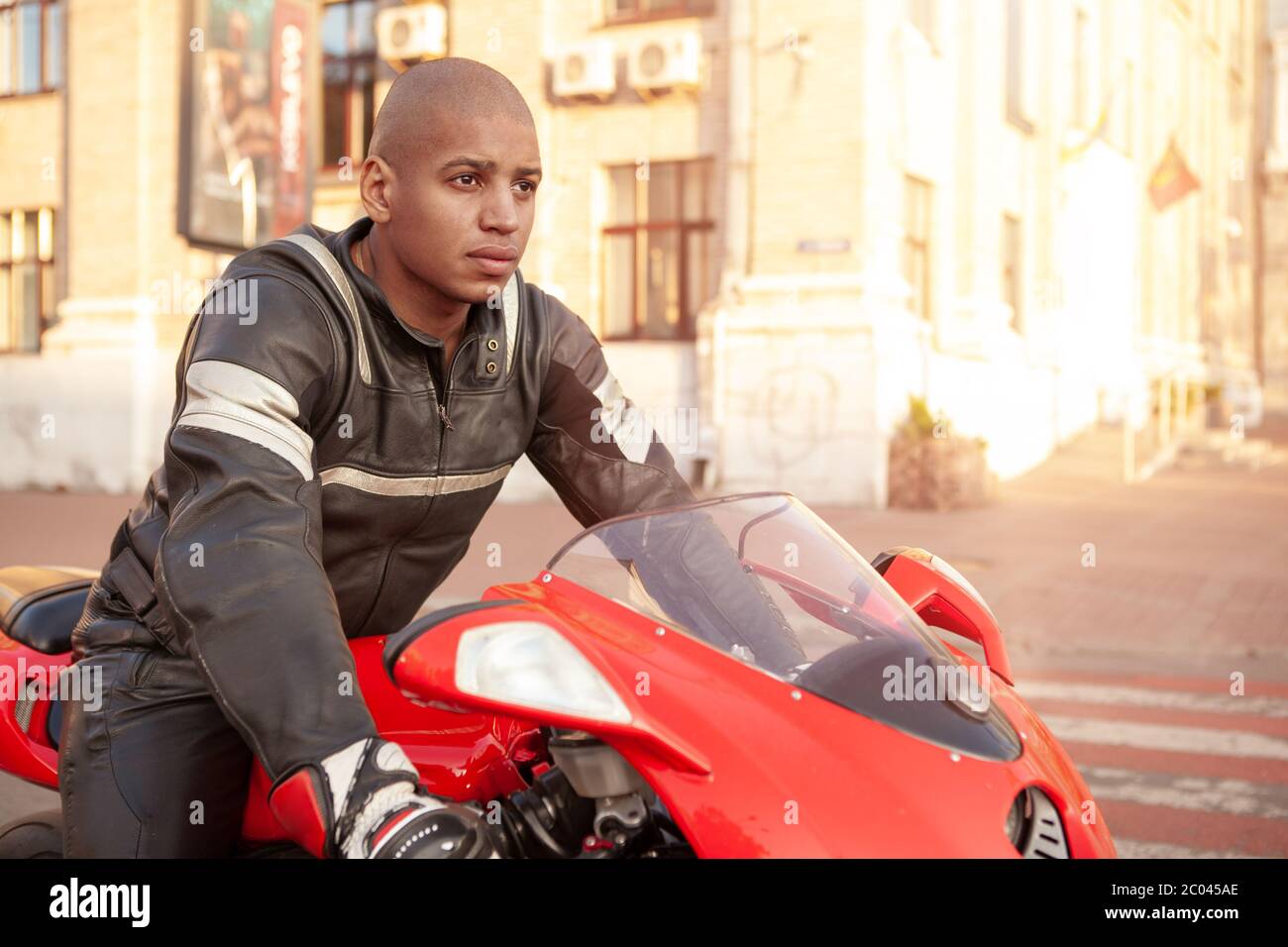 Motorbike driving away road hi-res stock photography and images - Alamy