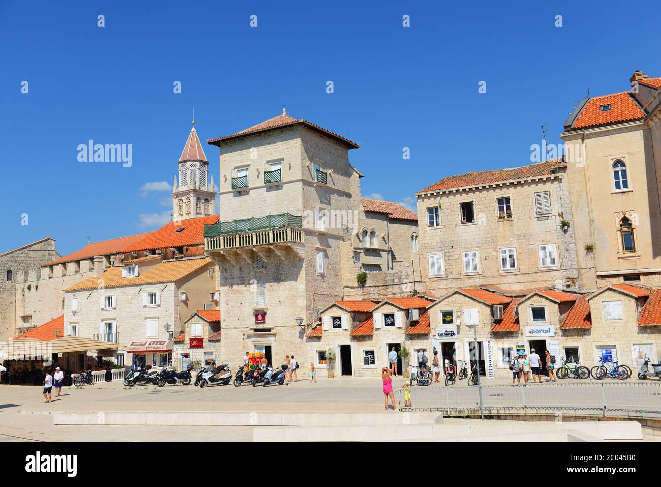 The waterfront promenade outside the old town city walls of Trogir ...