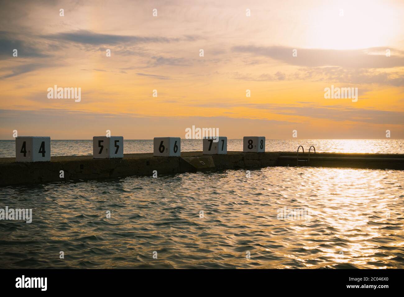 Seawater swimming pool at sunset in summer, Plage du Plat Gousset ...