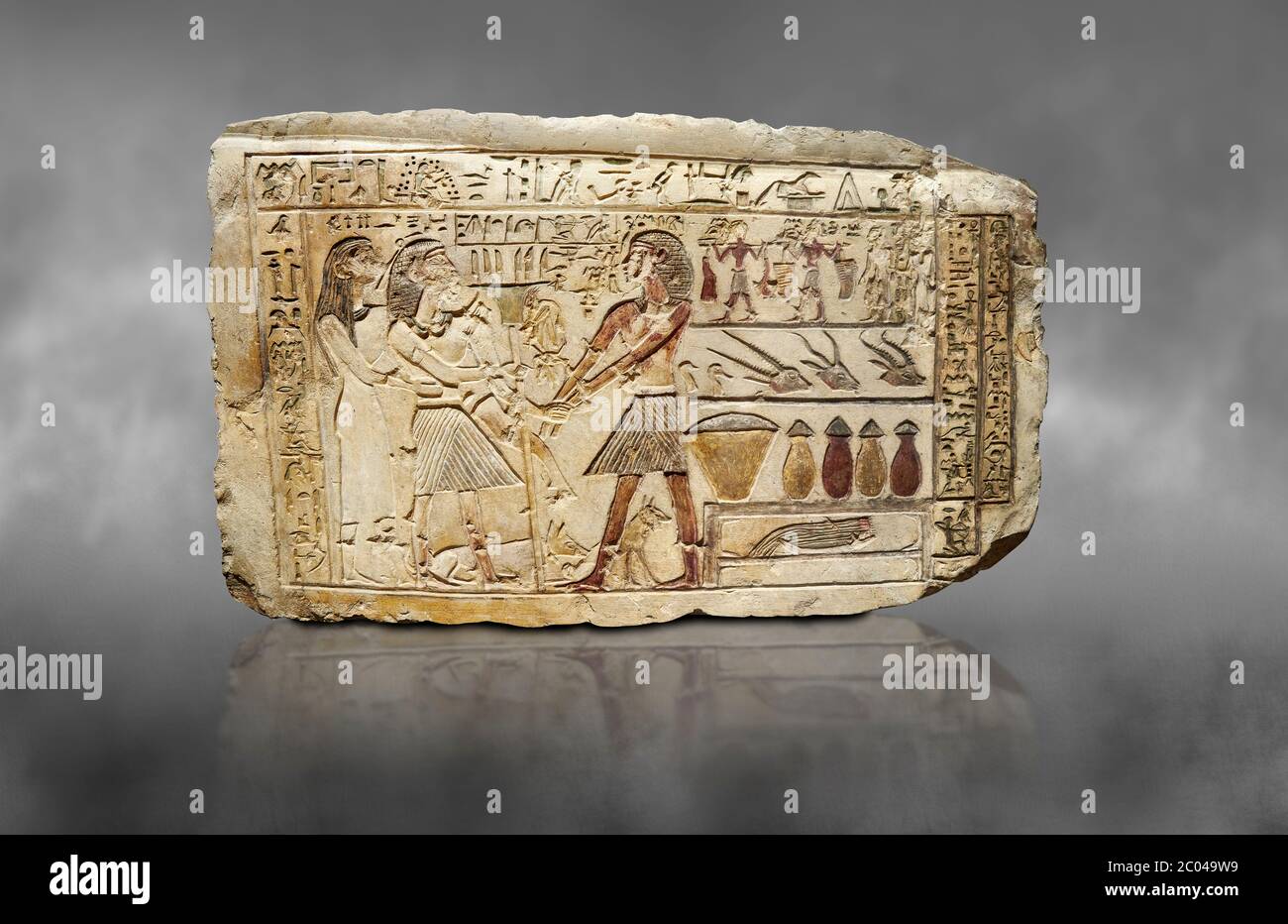 Ancient Egyptian stele showing Iti & Neferu receiving food offerings ...