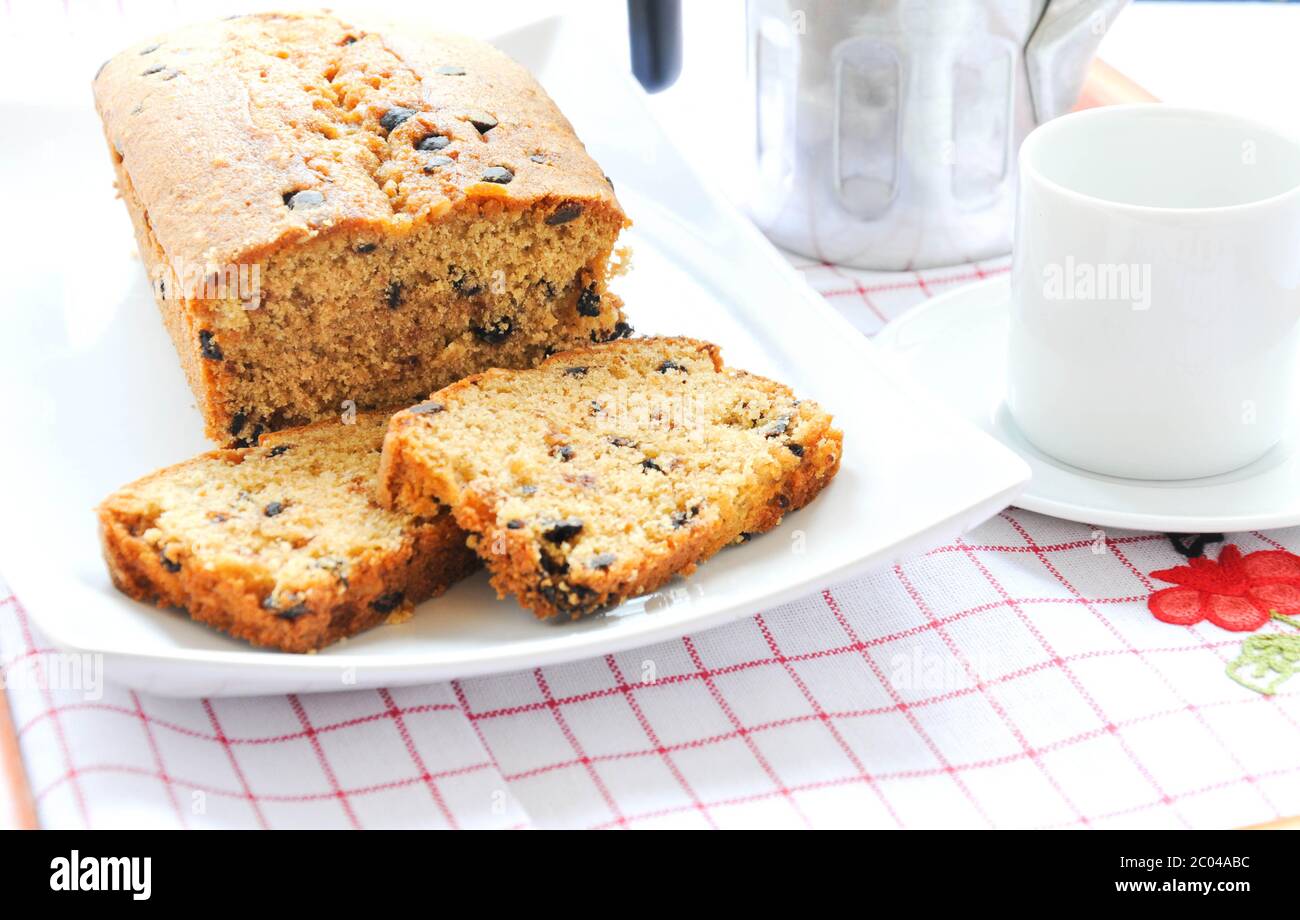 Plum cake with cocoa, apple and fruit and nuts Stock Photo - Alamy