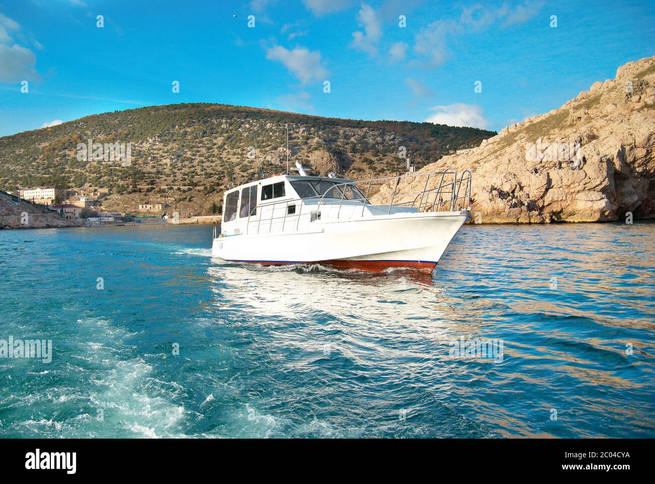 Motor boat cruising the sea Stock Photo - Alamy