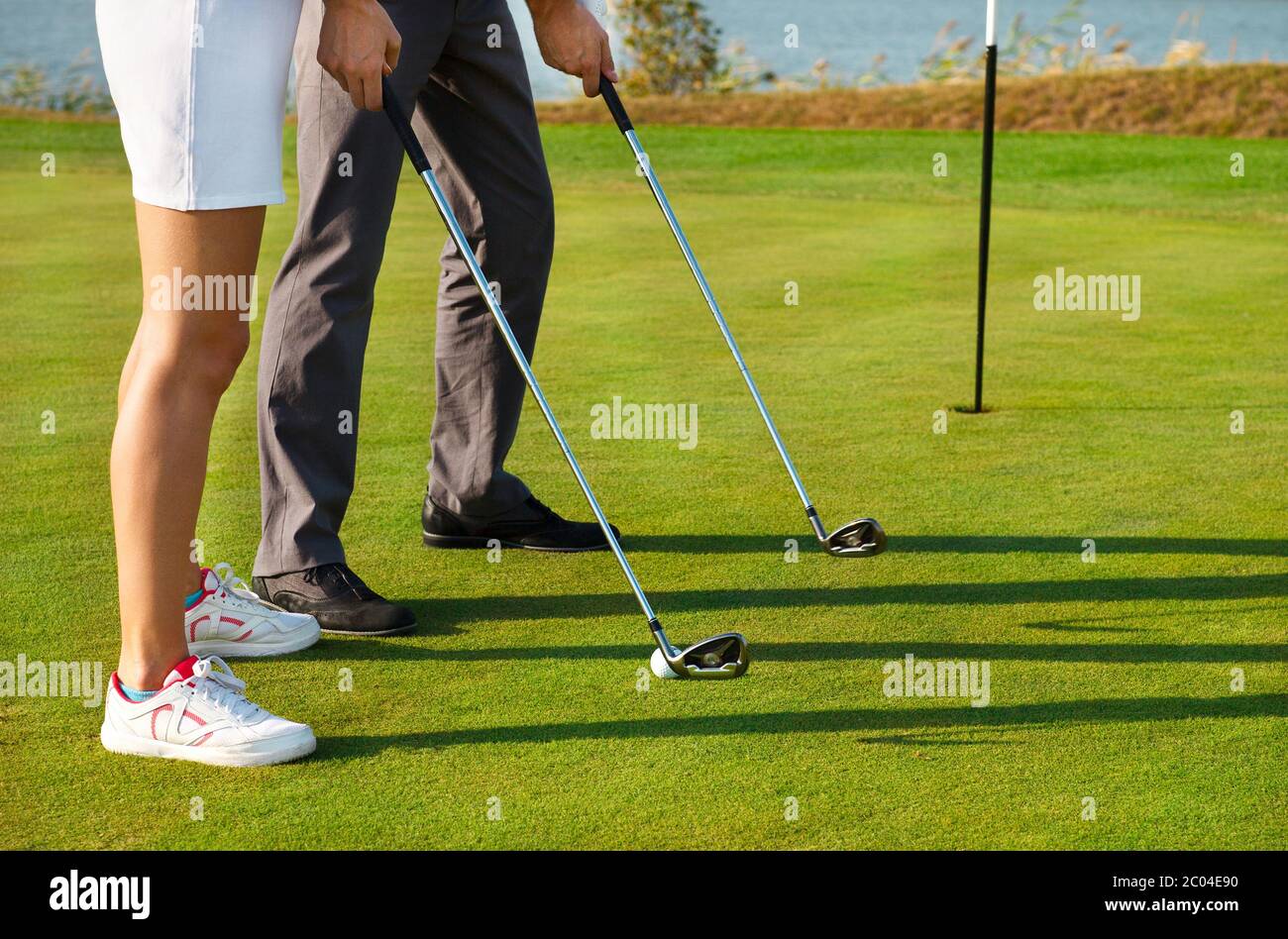 Two couple playing golf together hi-res stock photography and images ...