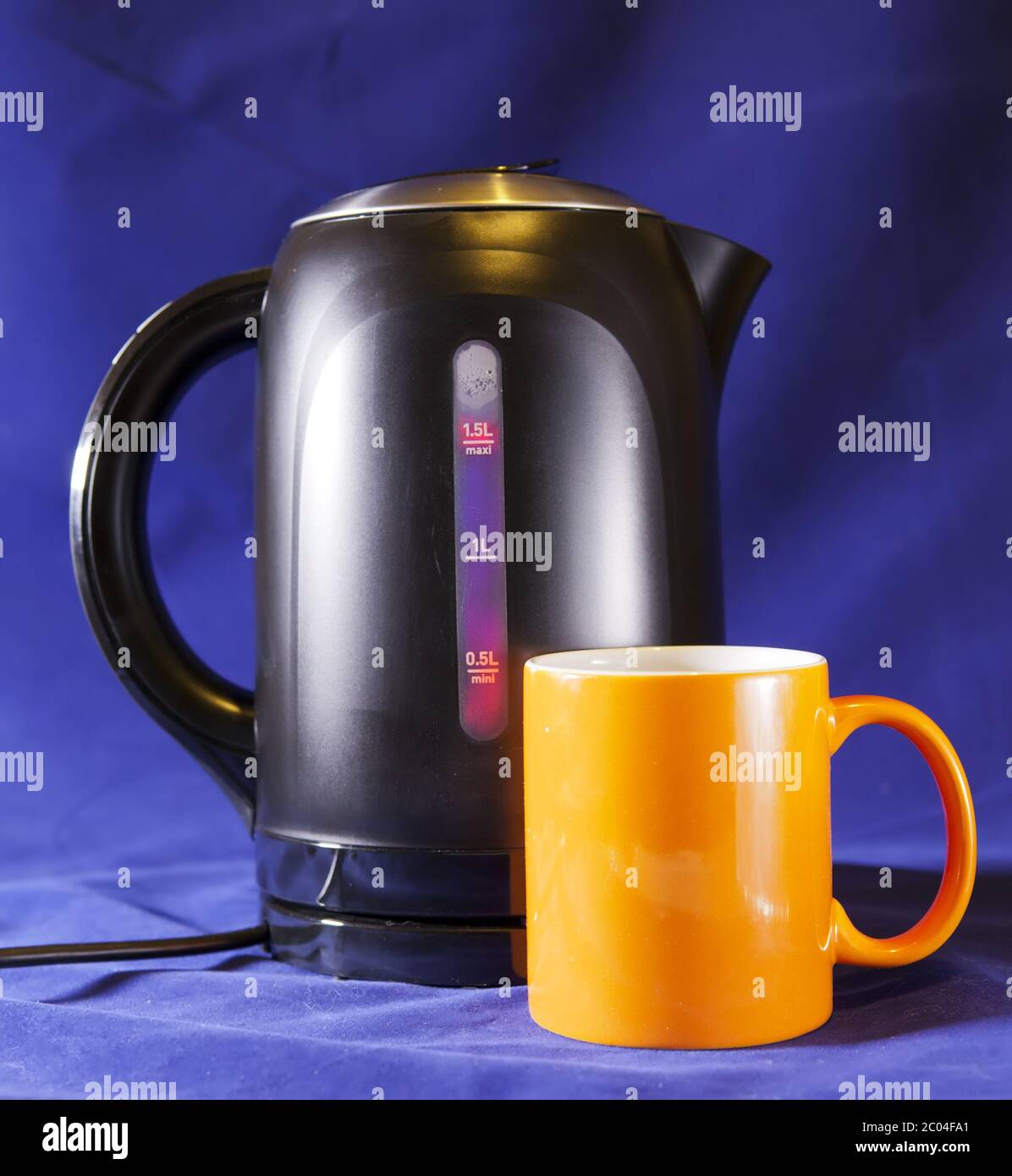 electric tea kettle and a mug Stock Photo - Alamy